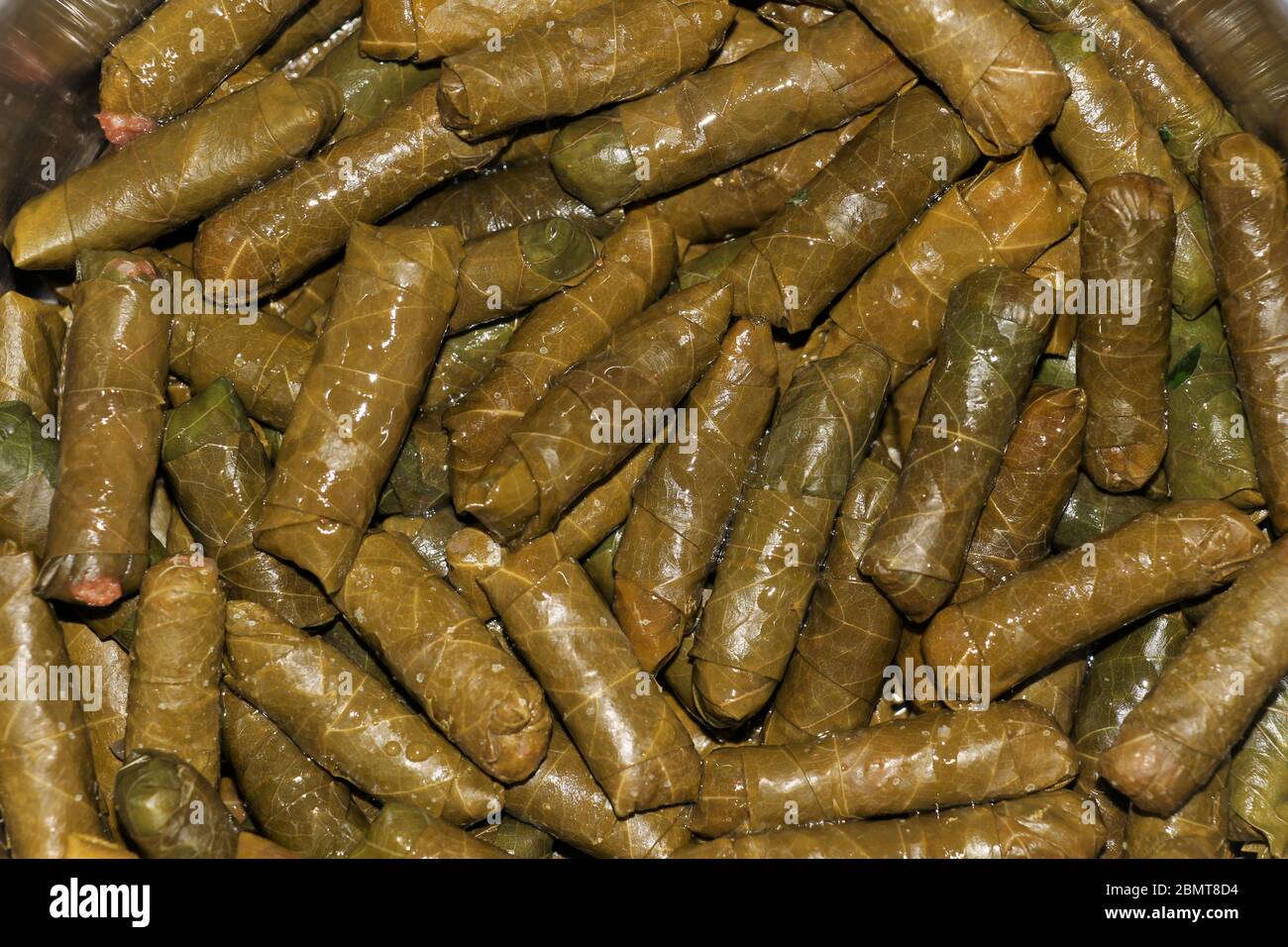 Traditional Turkish Dolma, Sarma or Dolmades on grey plate top view ...