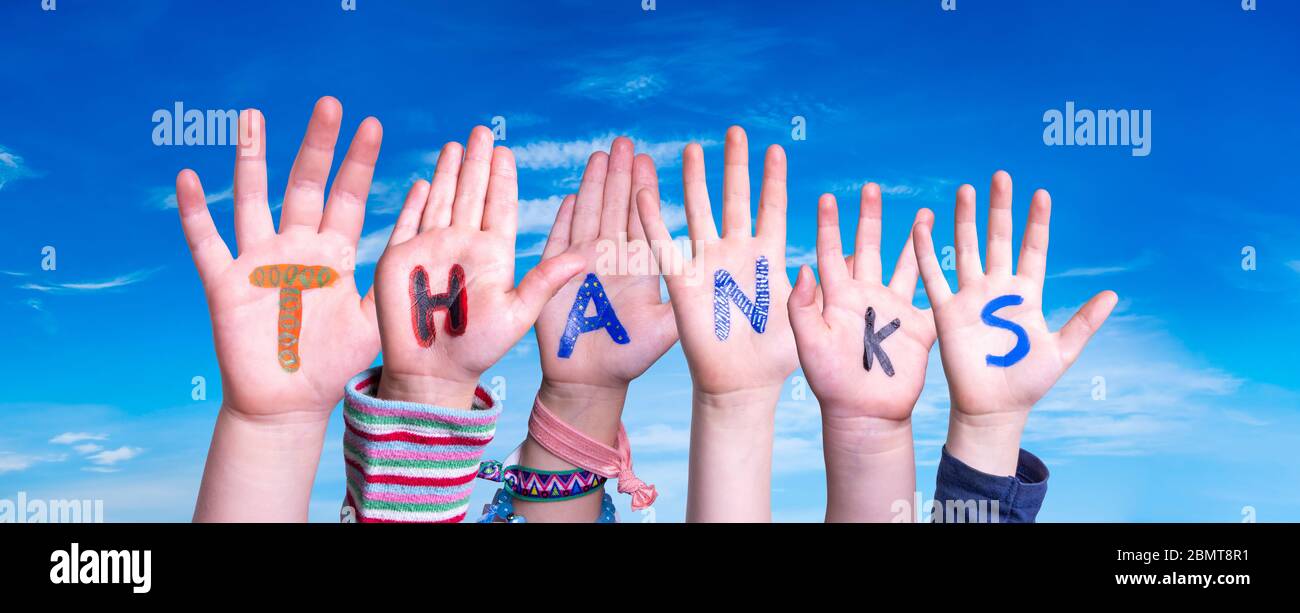 Children Hands Building Word Thanks, Blue Sky Stock Photo - Alamy