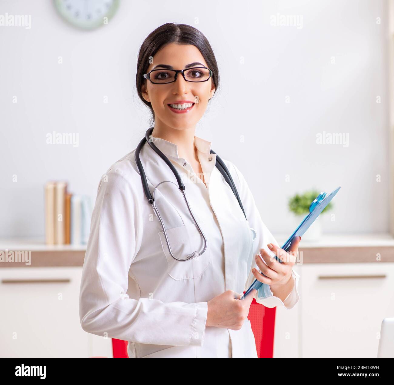 The woman doctor working in the hospital Stock Photo - Alamy