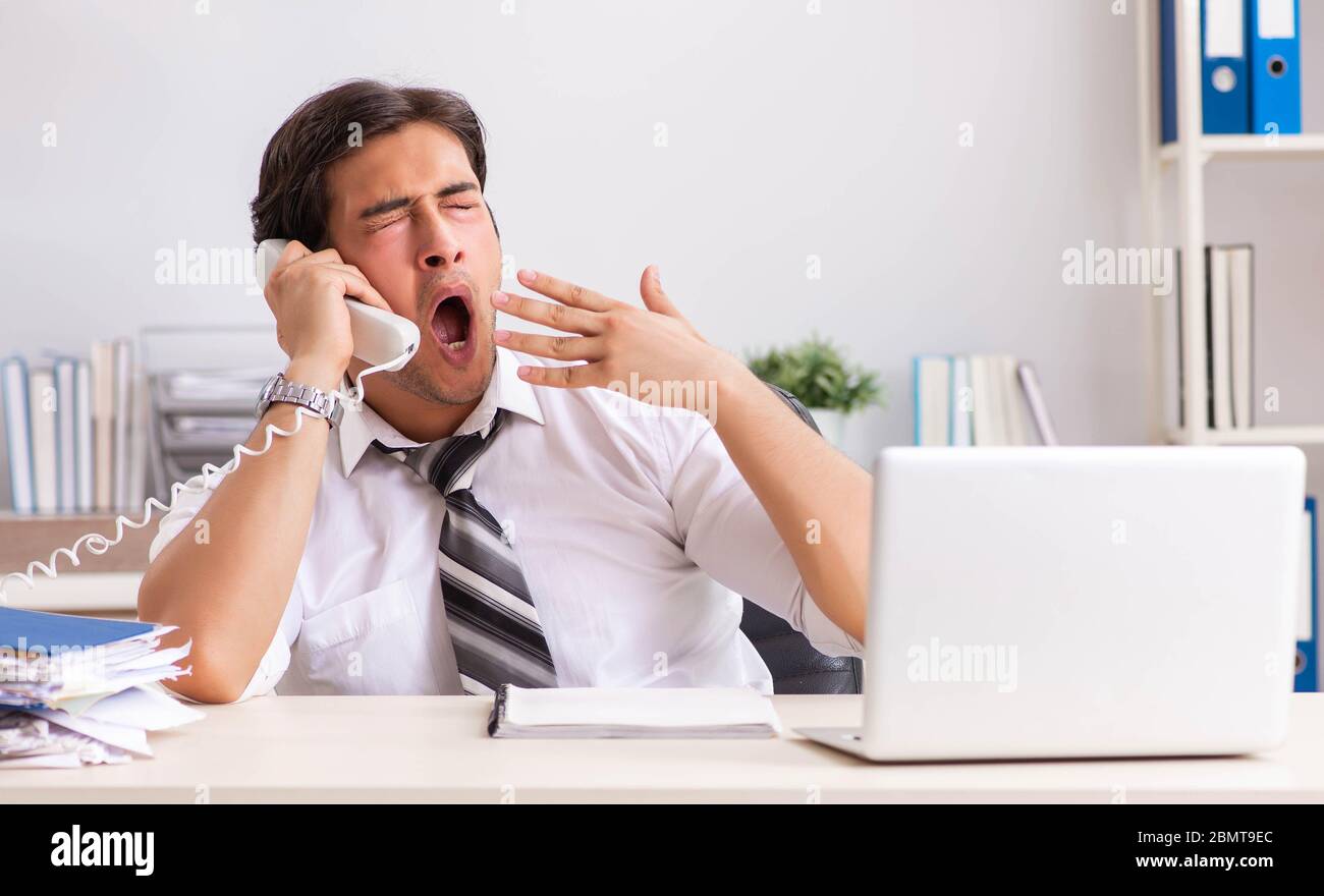 The young call center operator speaking on phone Stock Photo - Alamy