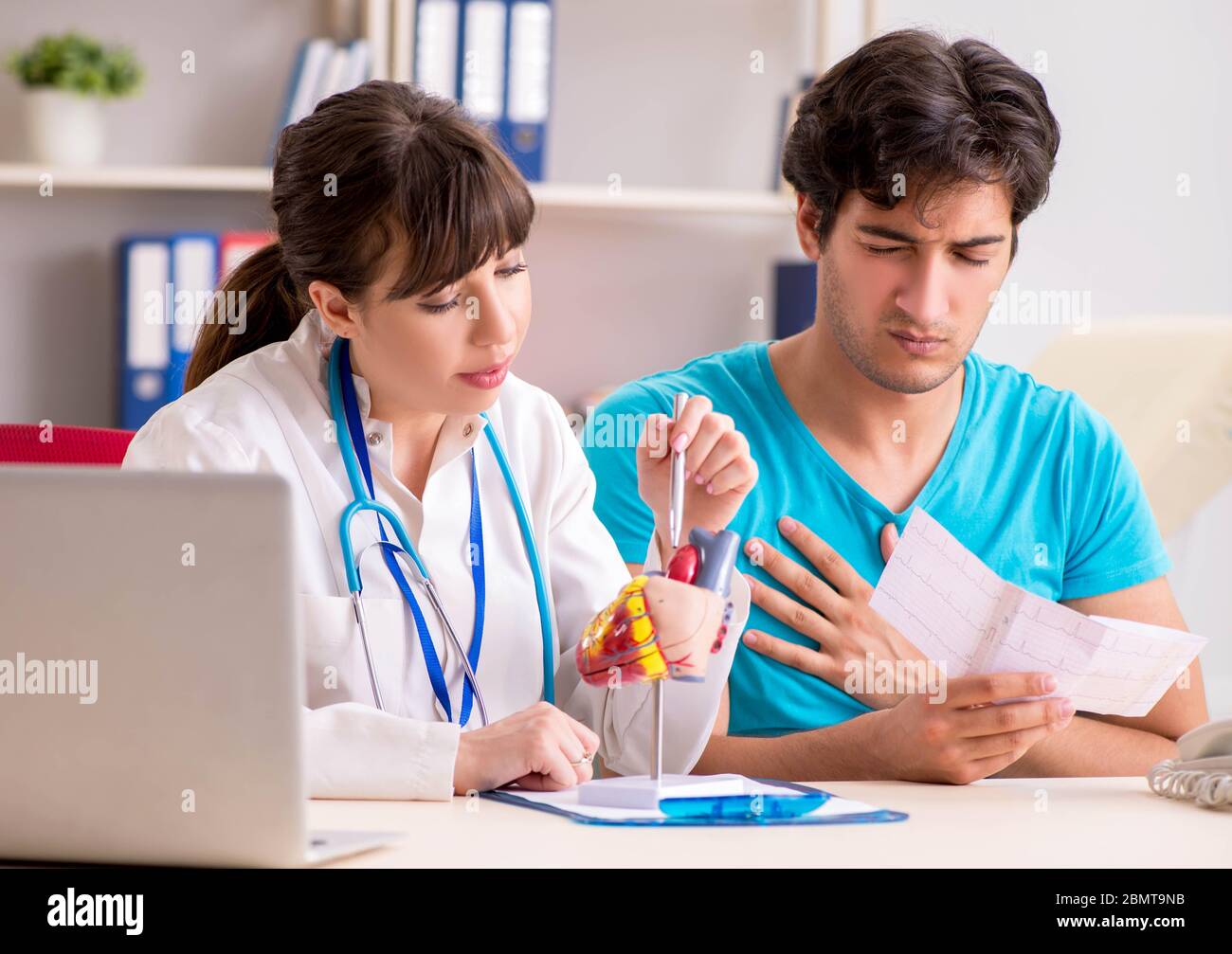 The young patient visiting doctor cardiologist Stock Photo - Alamy