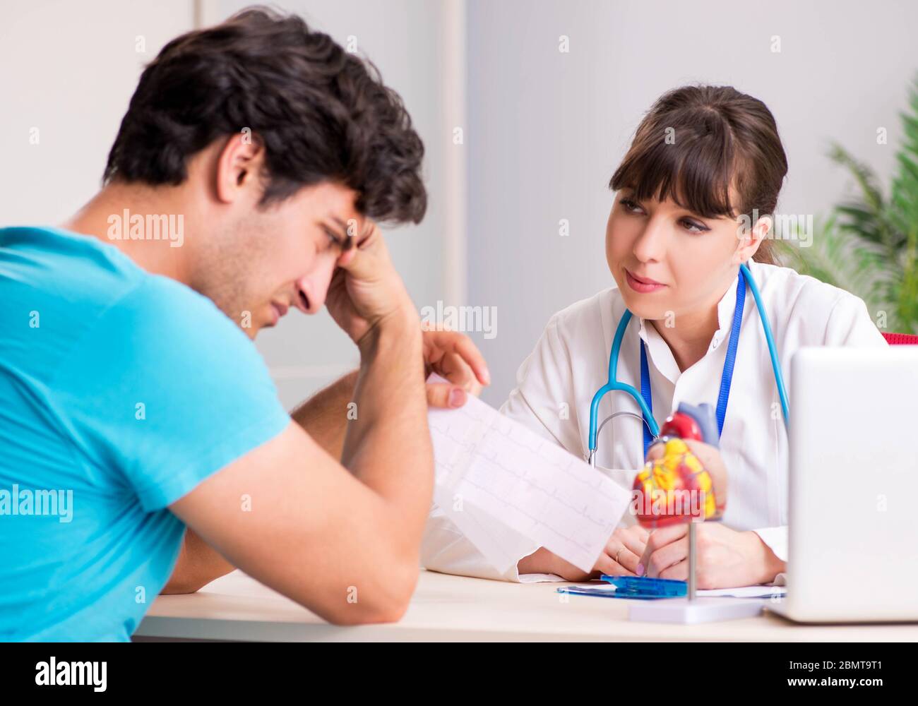 The young patient visiting doctor cardiologist Stock Photo - Alamy