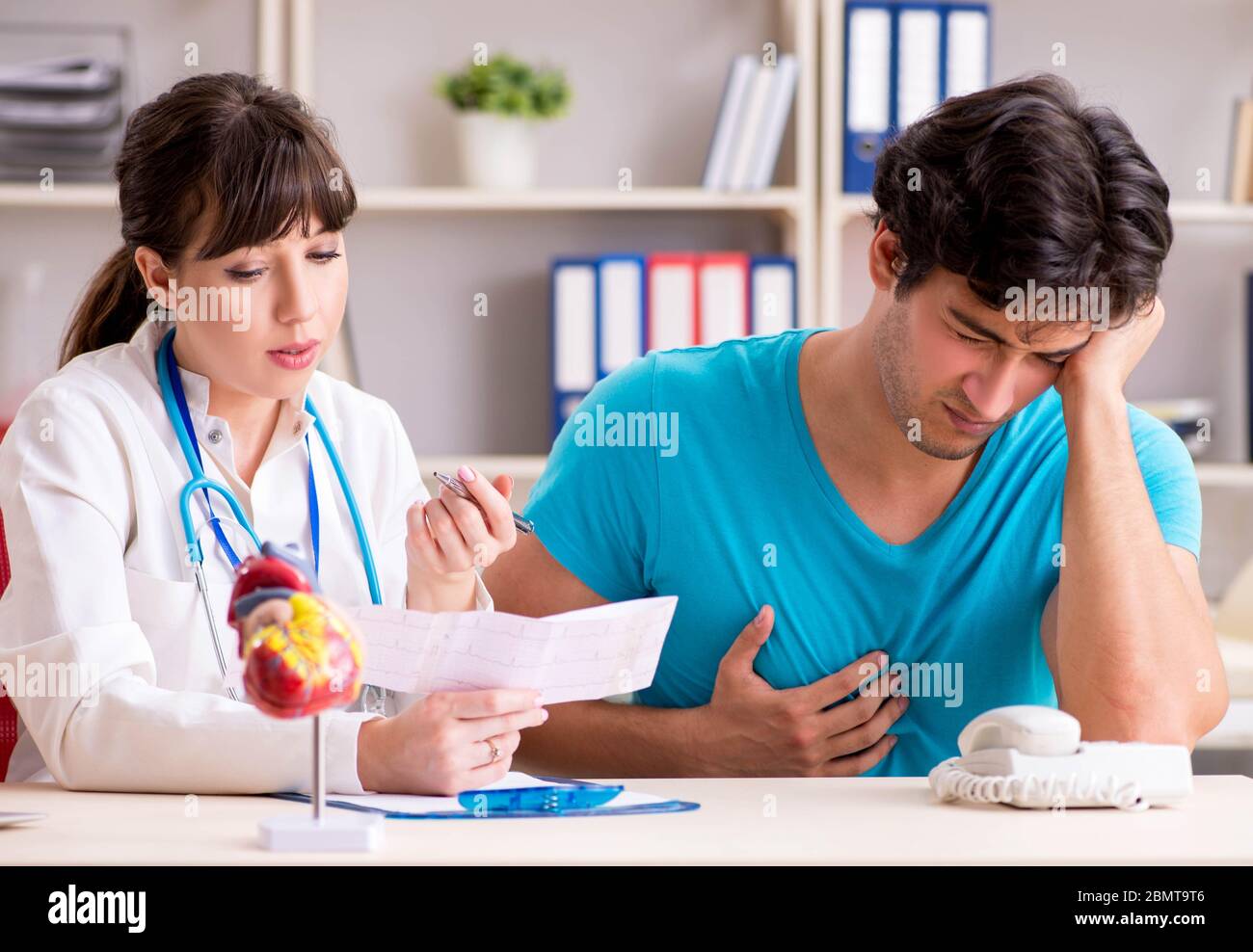 The young patient visiting doctor cardiologist Stock Photo - Alamy