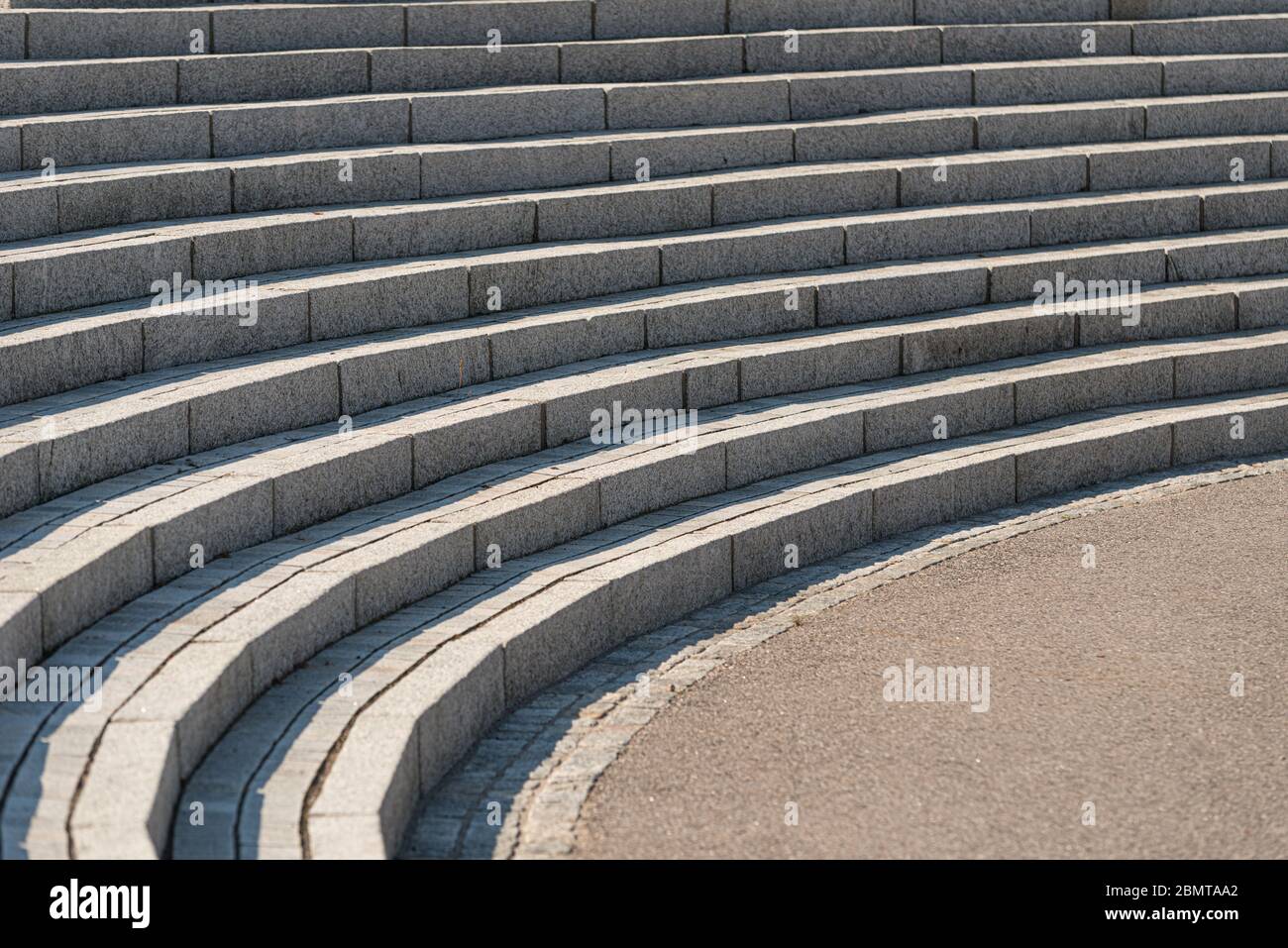 Curved steps made in stone Stock Photo - Alamy