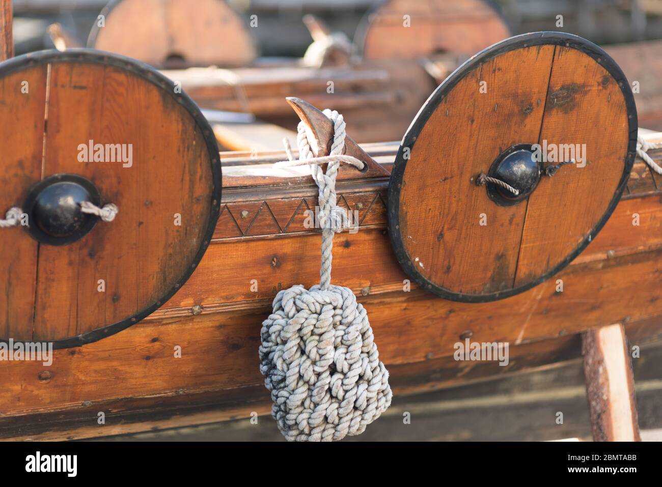 Rope fender and shields on a viking ship replica Stock Photo - Alamy