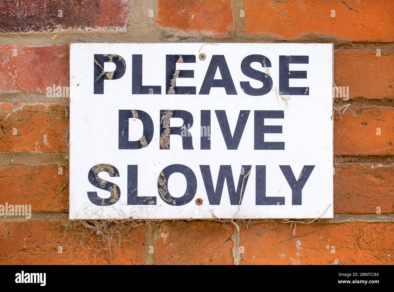 Please drive slowly sign hi-res stock photography and images - Alamy