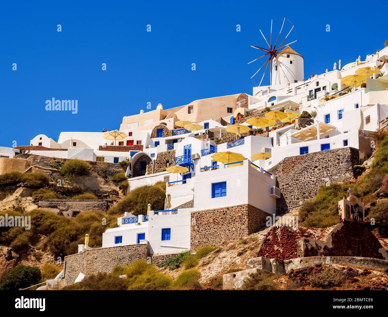 Amazing Santorini view on white cave houses from the Aegean sea ...
