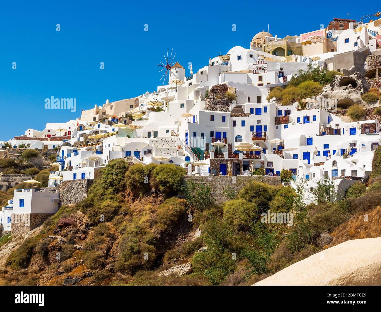 Amazing Santorini view on white cave houses from the Aegean sea ...