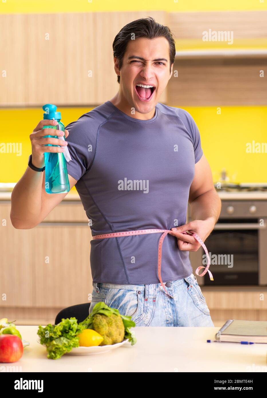 The young man in dieting and healthy eating concept Stock Photo - Alamy