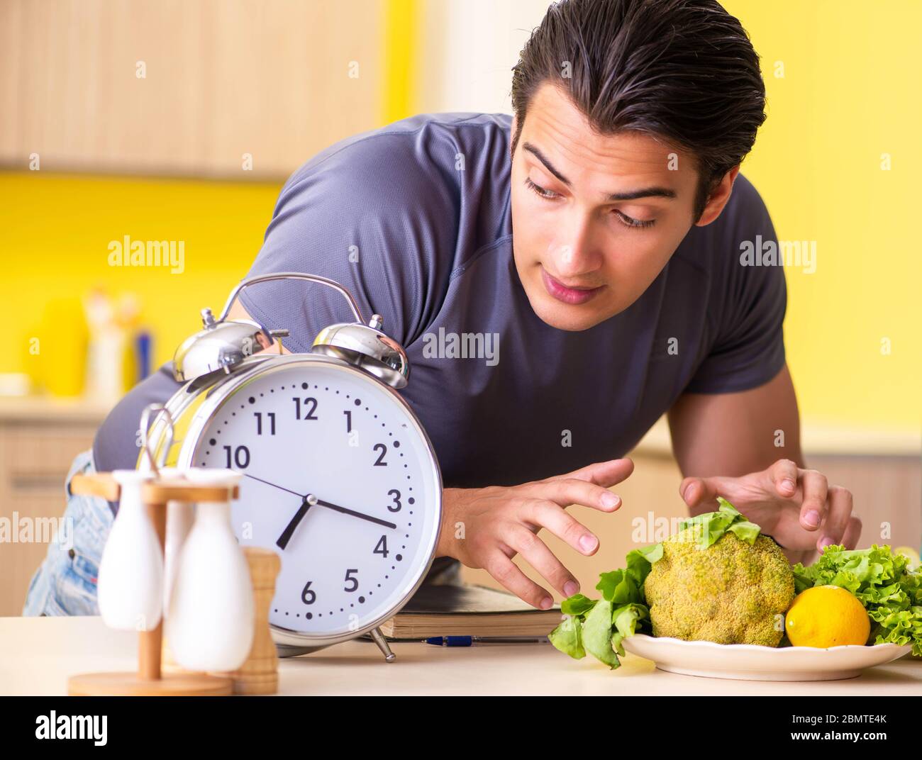 The young man in dieting and healthy eating concept Stock Photo - Alamy