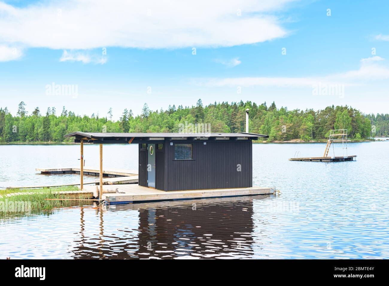 Floating sauna in a lake Stock Photo - Alamy
