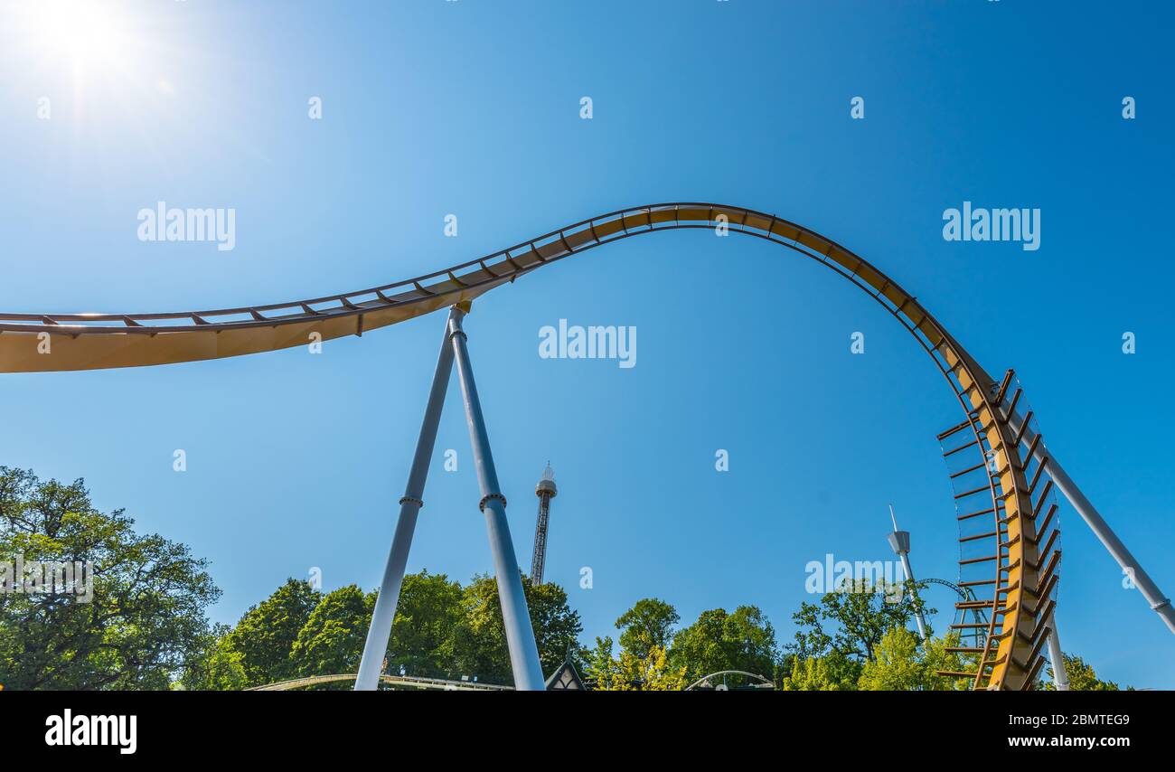 Turn and loop of a roller coaster track Stock Photo - Alamy