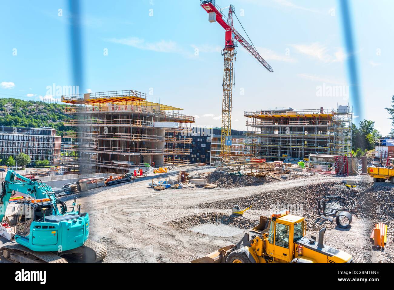 Crane and heavy equipment at a construction site Stock Photo - Alamy