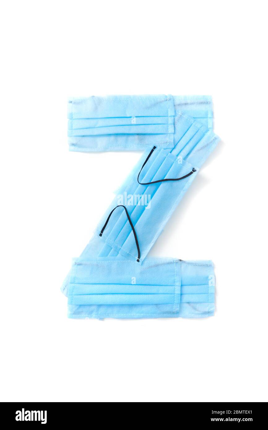 Letter Z made from protective medical masks on a white background Stock ...