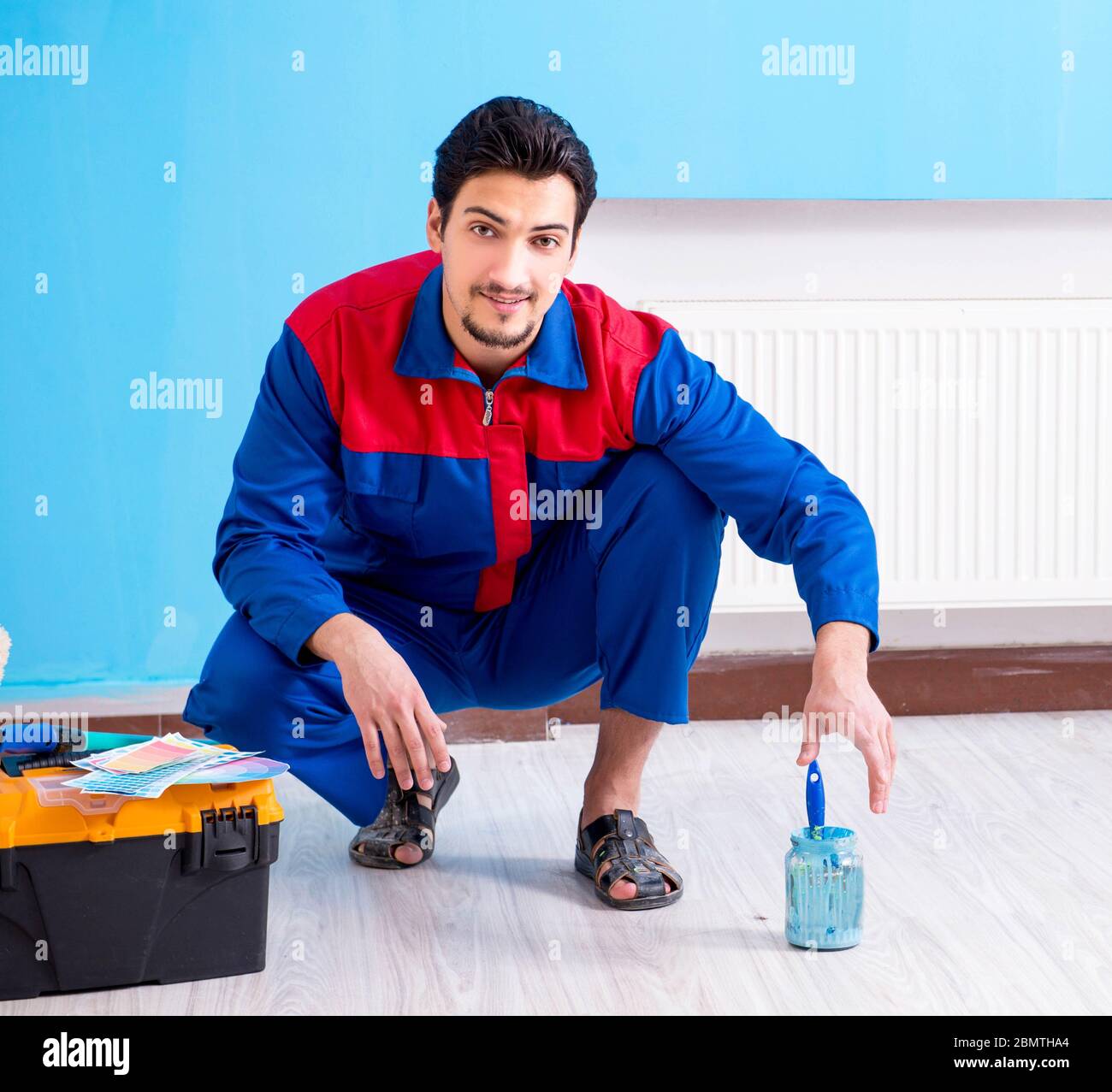 The young man doing home renovation Stock Photo - Alamy