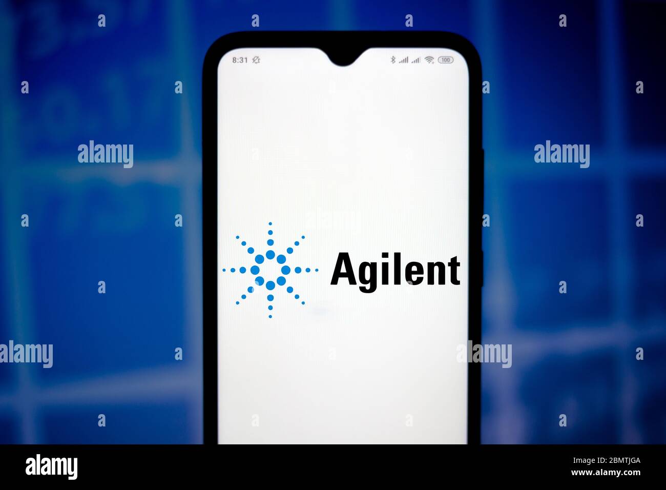 In this photo illustration the Agilent Technologies logo seen displayed ...