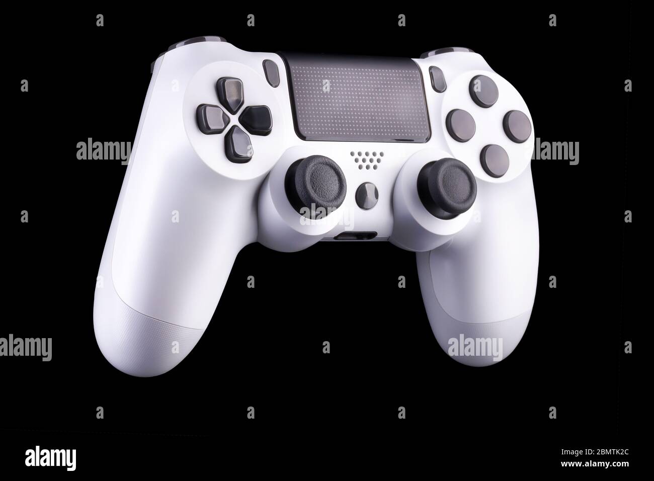 White video game joystick gamepad isolated on a black background Stock ...