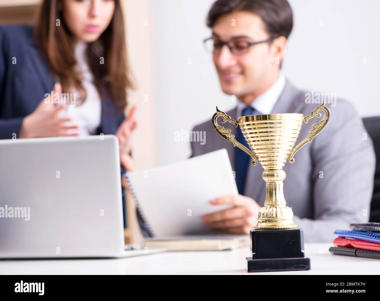 The concept of teamwork with prize Stock Photo - Alamy