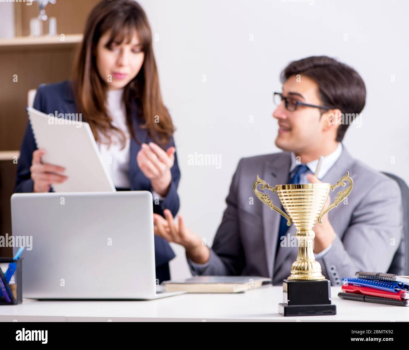The concept of teamwork with prize Stock Photo - Alamy