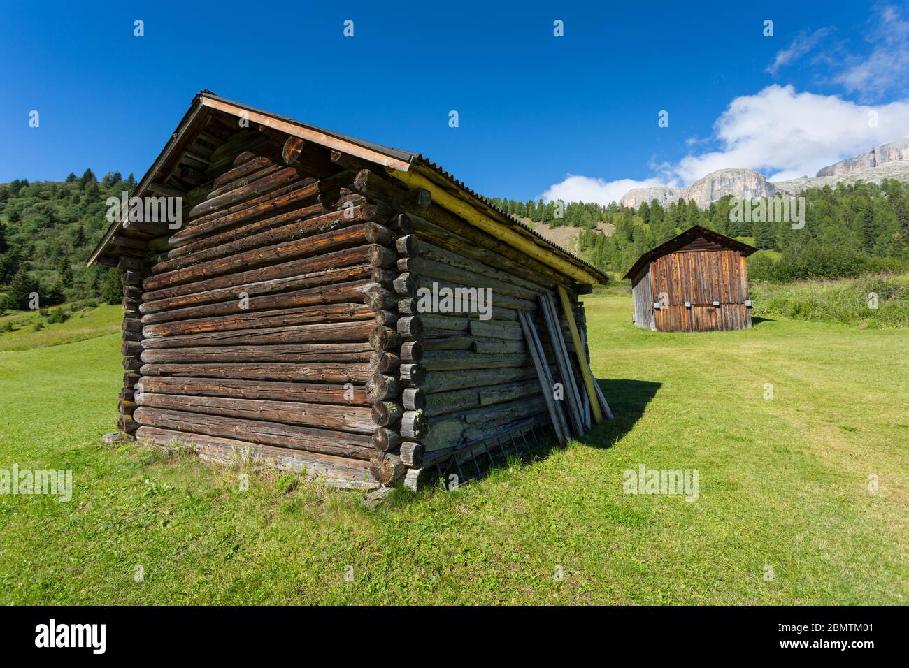 Wooden barns and mountains in Alta Badia near Corvara, Dolomites, South ...
