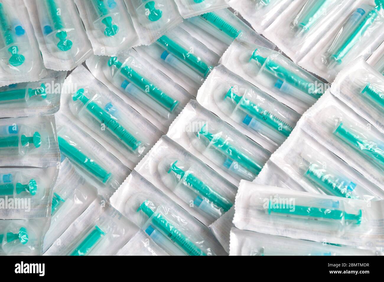 Medical syringes in a package. A bunch of unused, packaged syringes ...