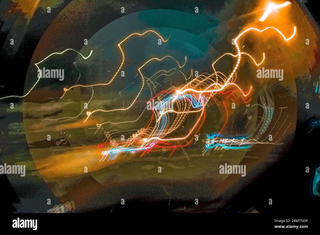 Long exposure photograph of neon colours (red, yellow and blue) in an ...