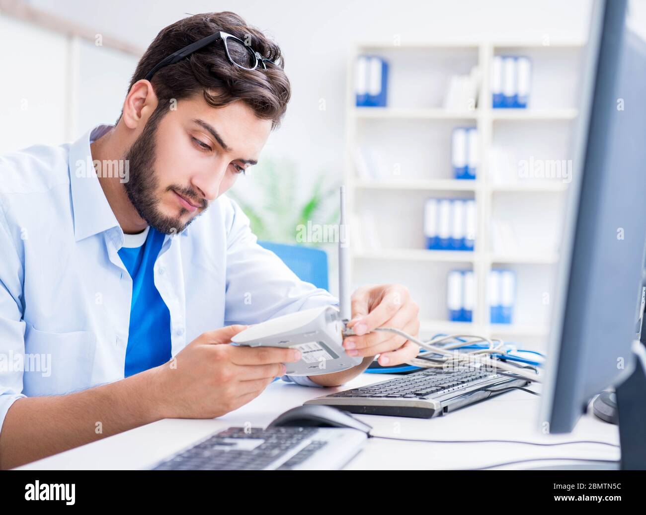 The frustrated young man due to weak internet reception Stock Photo - Alamy