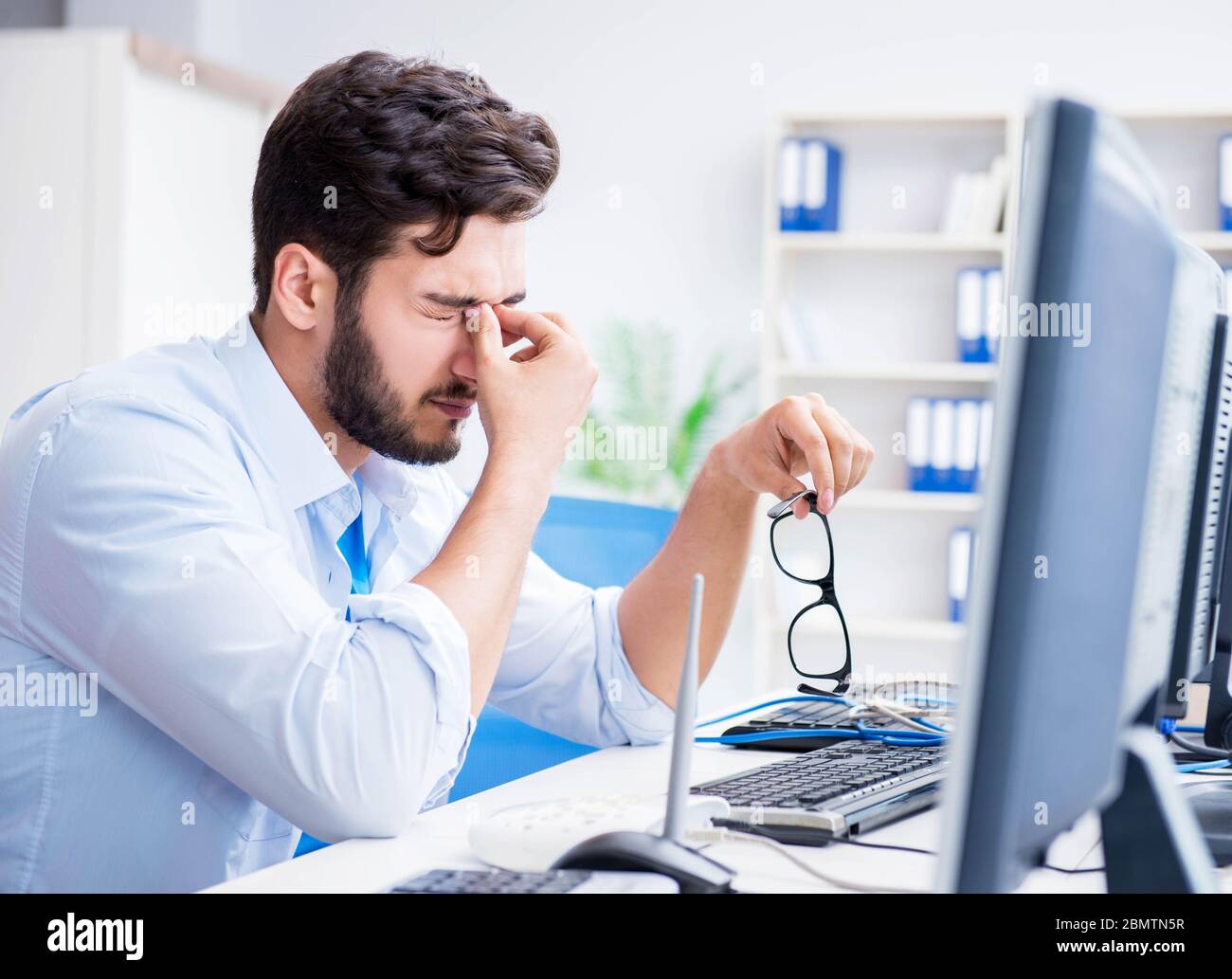 The it technician looking at it equipment Stock Photo - Alamy