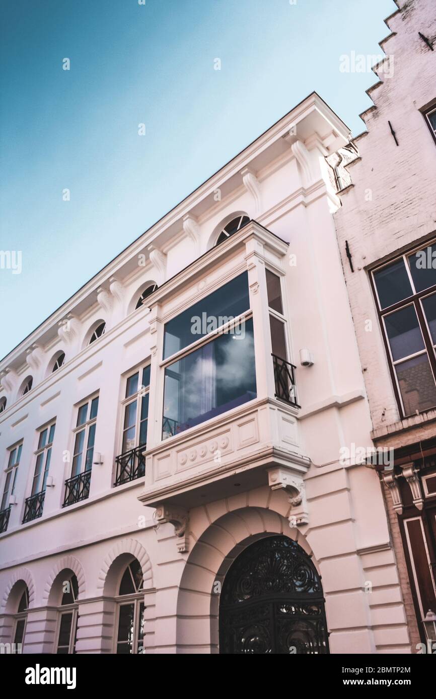 Pink-coloured house facade in detail Stock Photo - Alamy