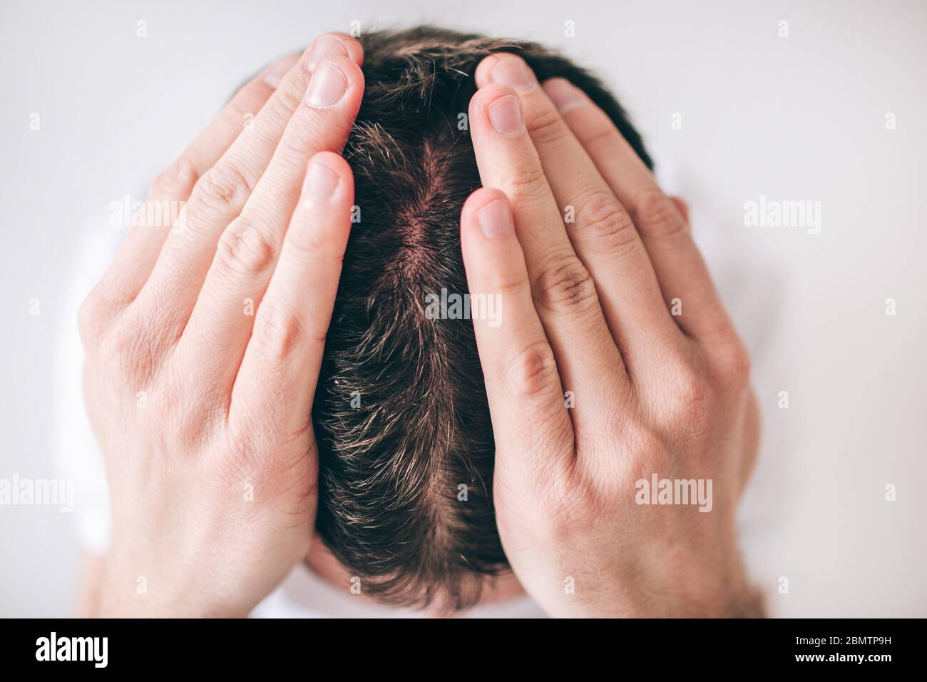 Young man isolated over white background. Close up picture of head ...