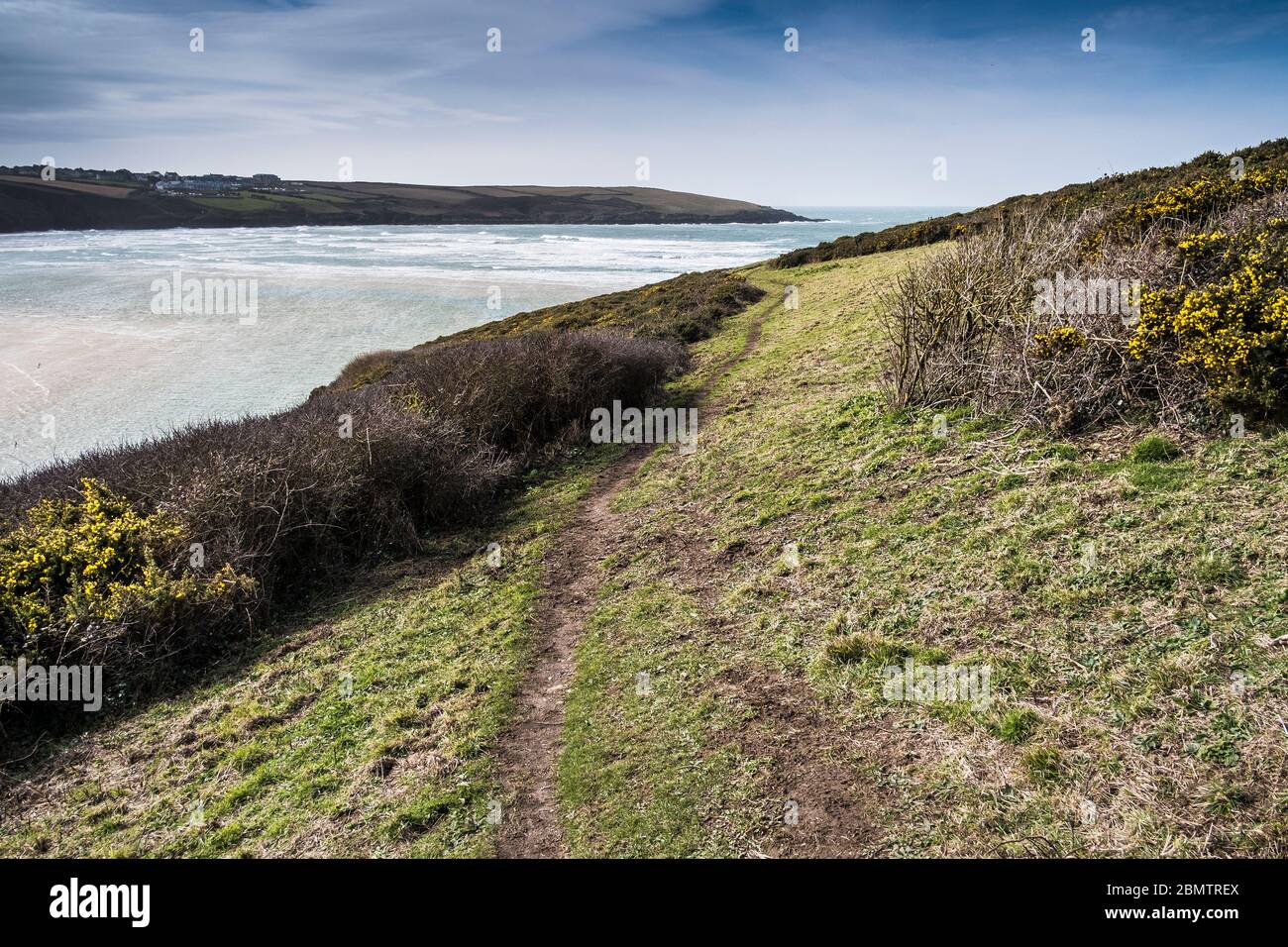 A walking route along Pentire Point East overlooking Crantock Beach in ...