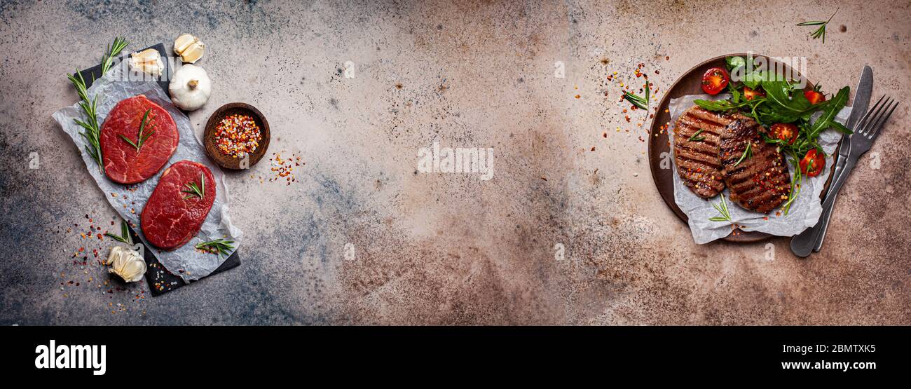 Meat banner background. Raw beef meat on a slate board with spices and ...