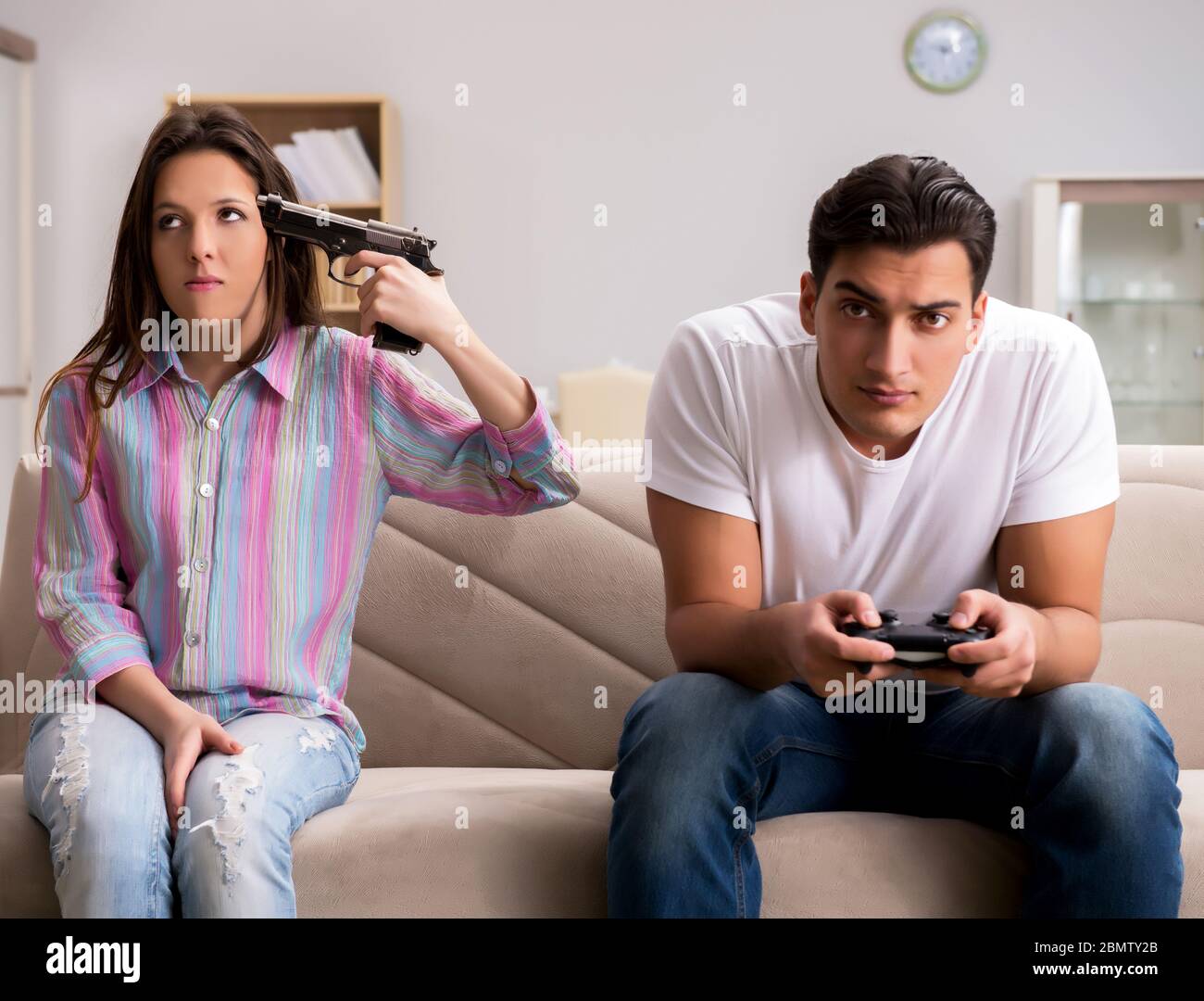 The young family suffering from computer games addiction Stock Photo ...