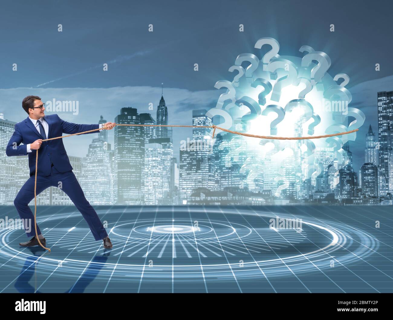 The businessman pulling question marks in uncertainty concept Stock ...