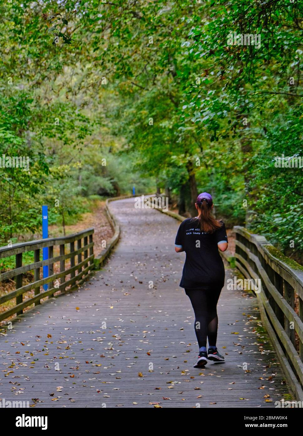 Runner in black hi-res stock photography and images - Alamy