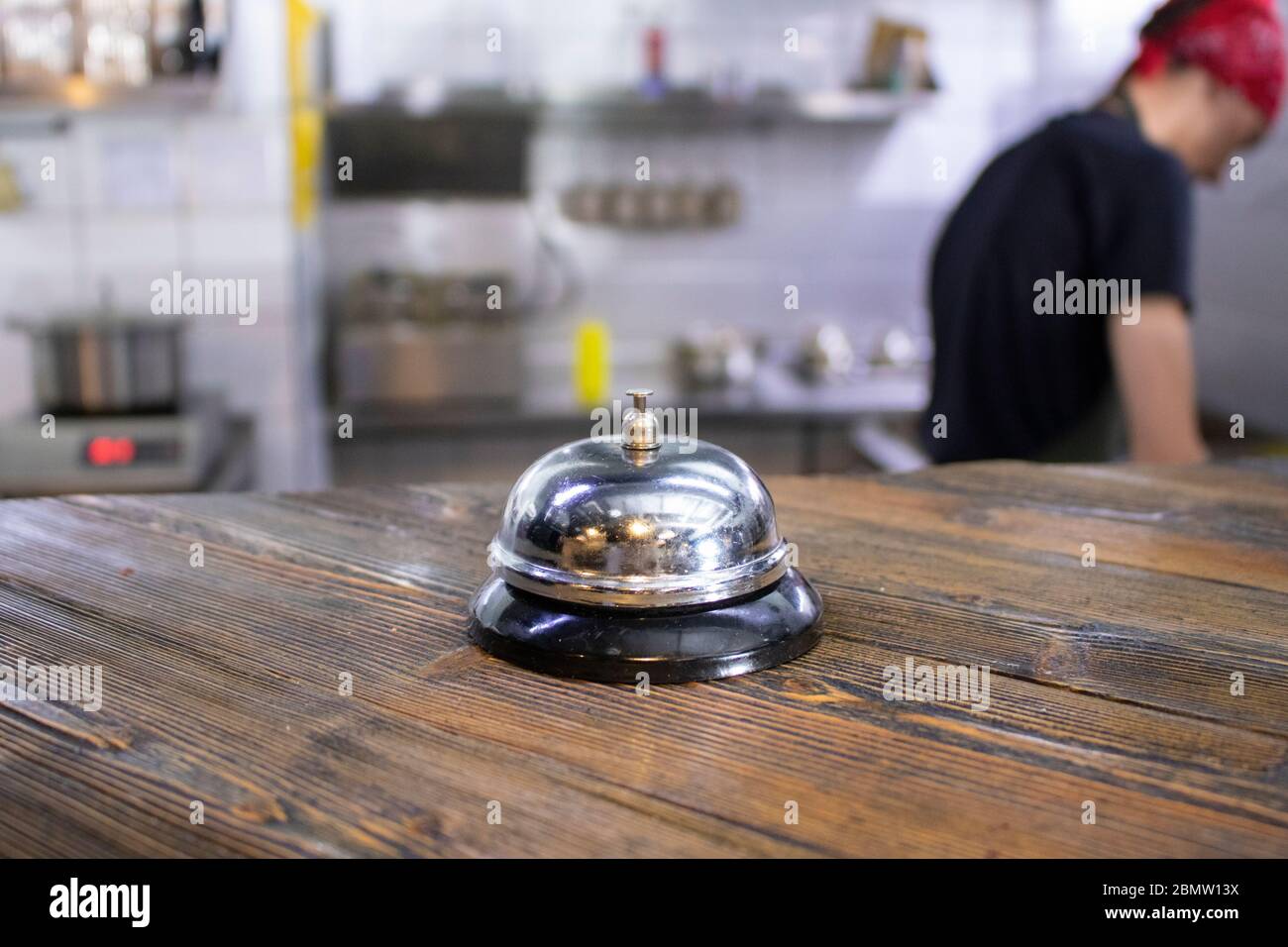 Bell for waiters in the cafe. Chief cooking Stock Photo - Alamy