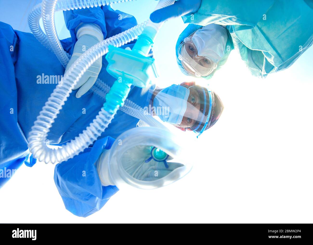 Giving first medical help in hospital. Doctors give resuscitation to ...