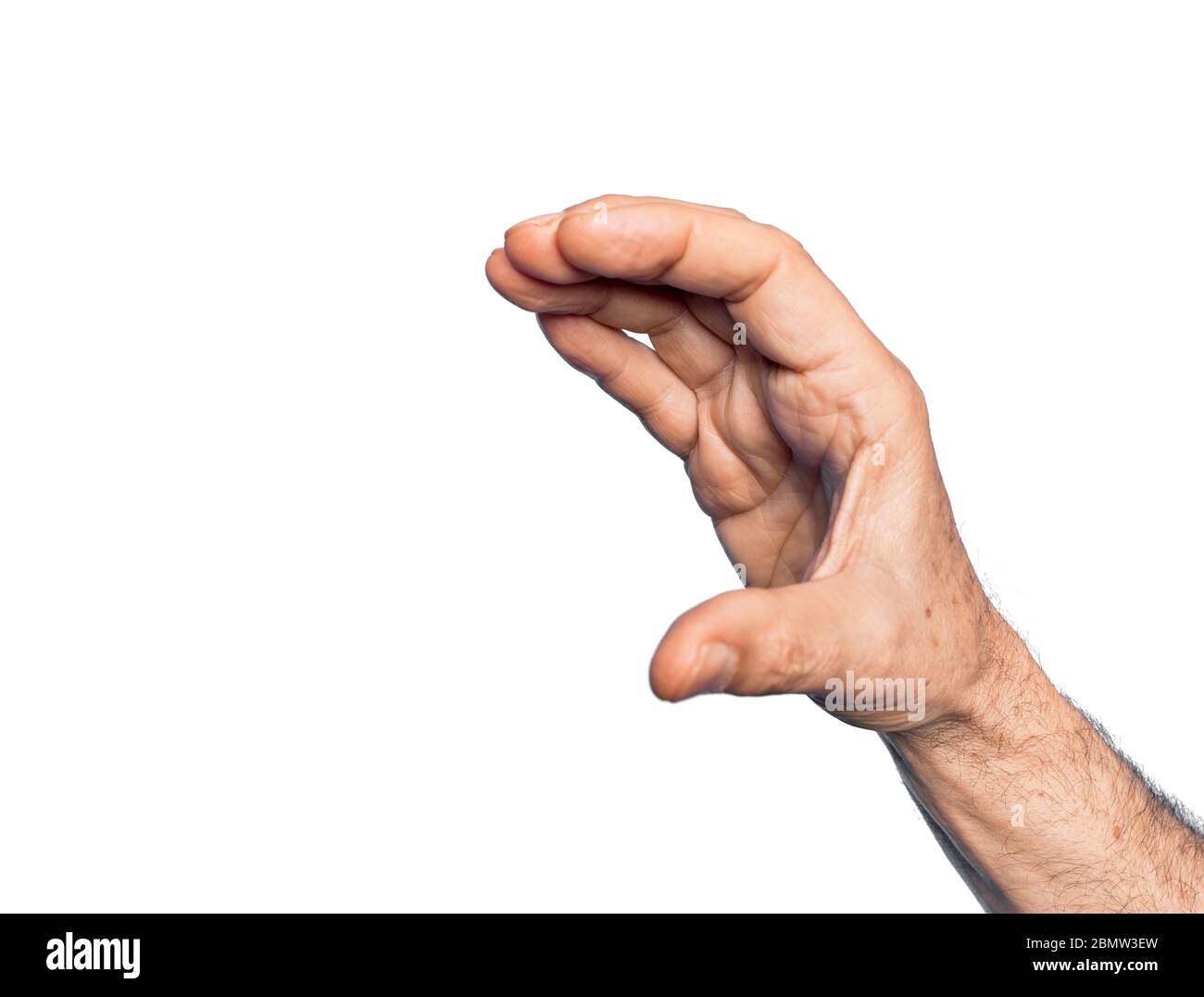 Hand of caucasian middle age man over isolated white background picking ...