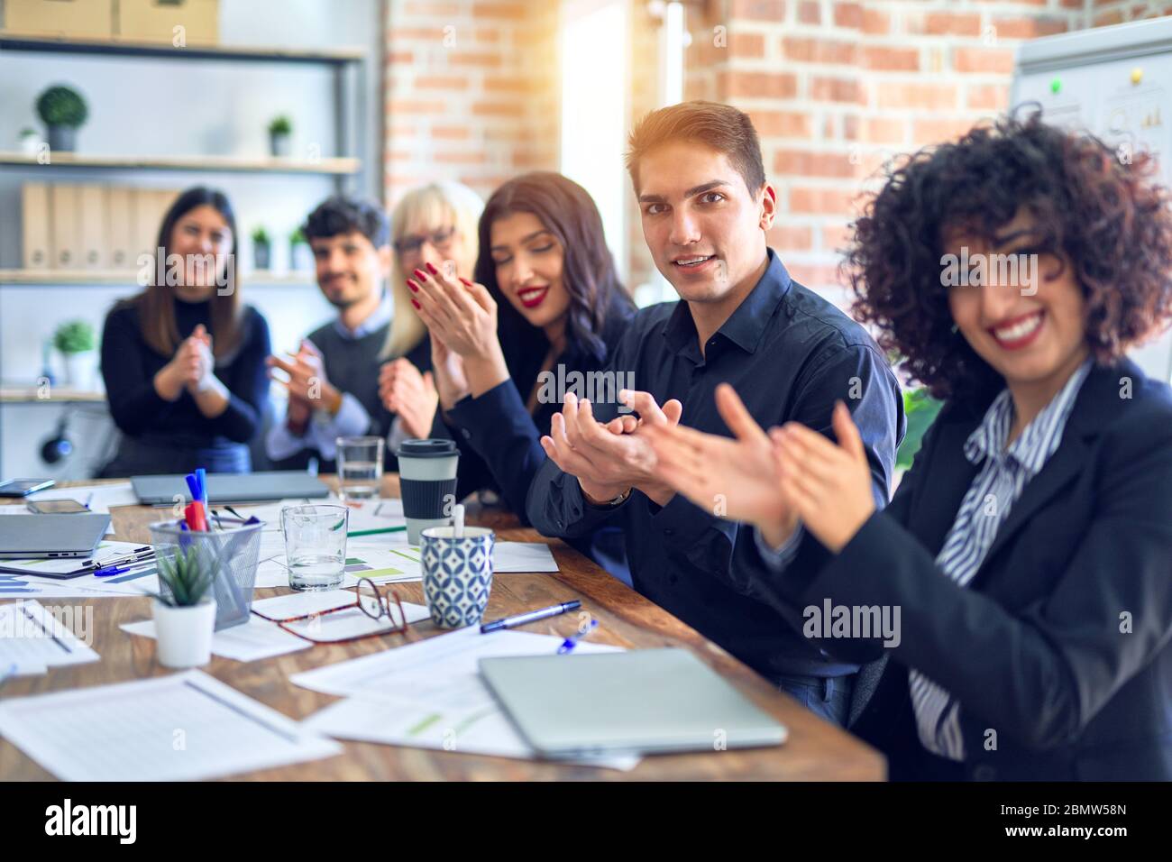 Group of business workers smiling happy and confident. Working together ...