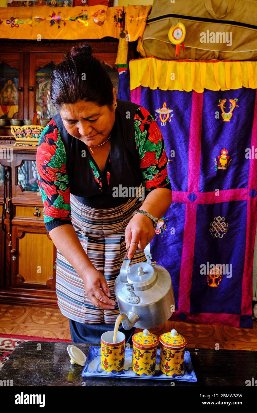 Nepal, Kathmandu valley, sherpa woman making traditional tibetan tea ...