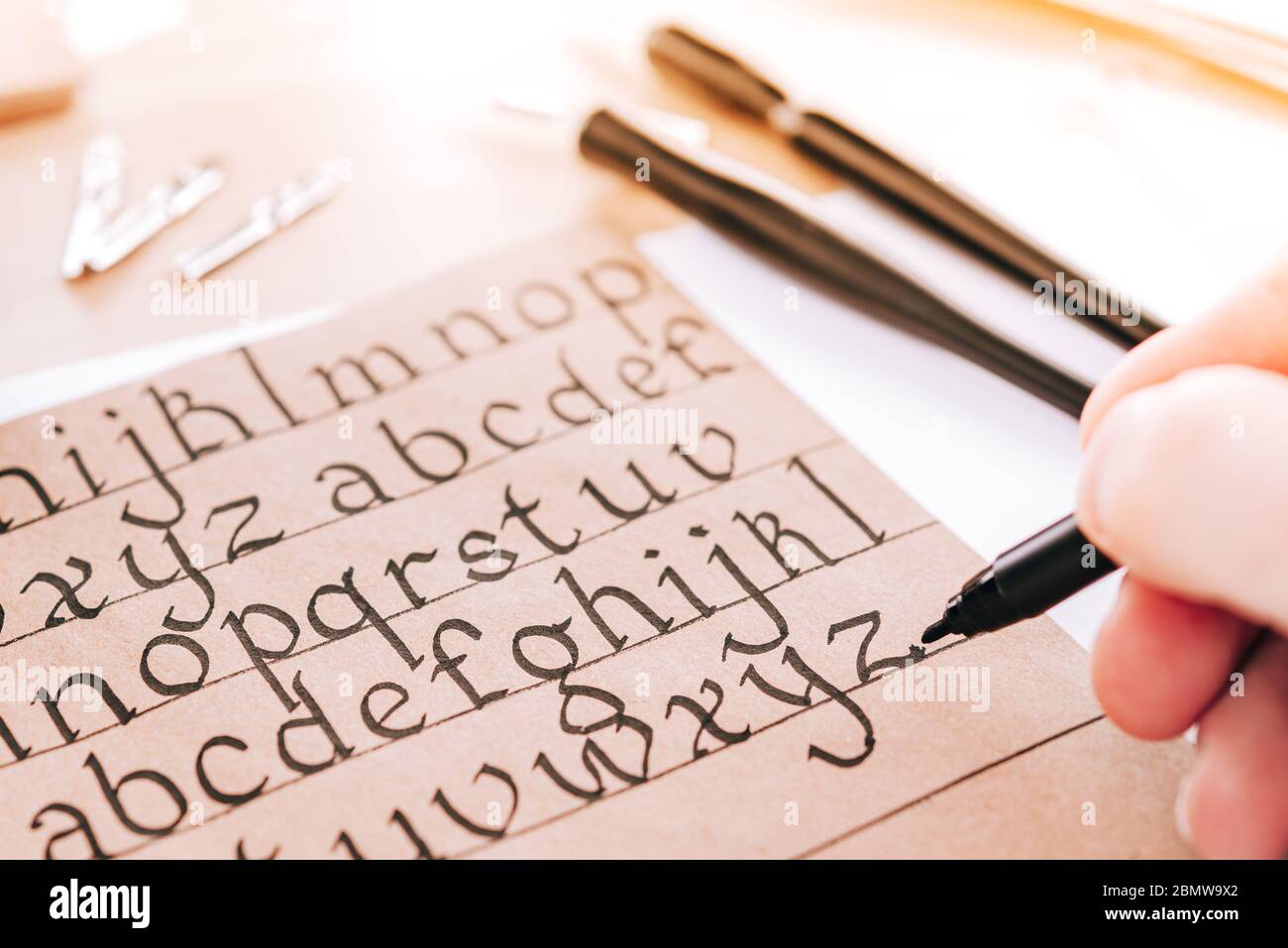 The process of learning calligraphy, handwriting,Latin alphabet Stock ...