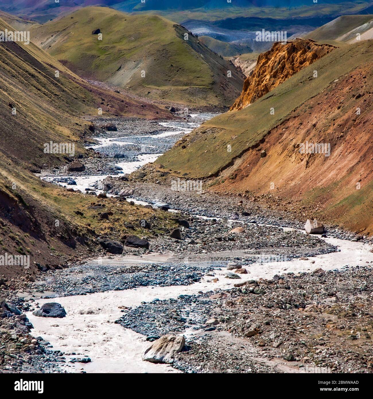 Scenic landscape of the sandy gorge between hills. Mountainious terrain ...