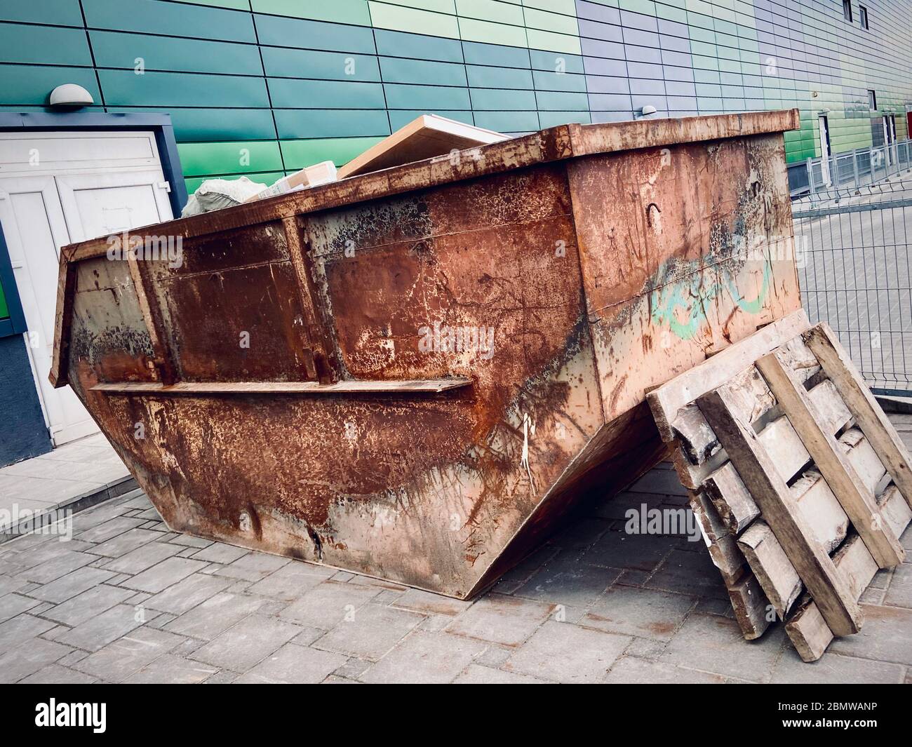 Different garbage containers on the street. Mobile photo. Summer Stock ...