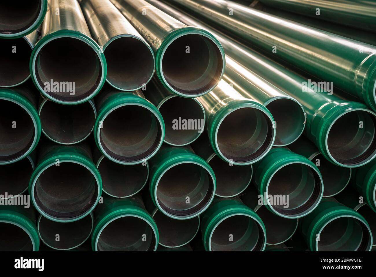 Stack of pipes on a construction site Stock Photo - Alamy