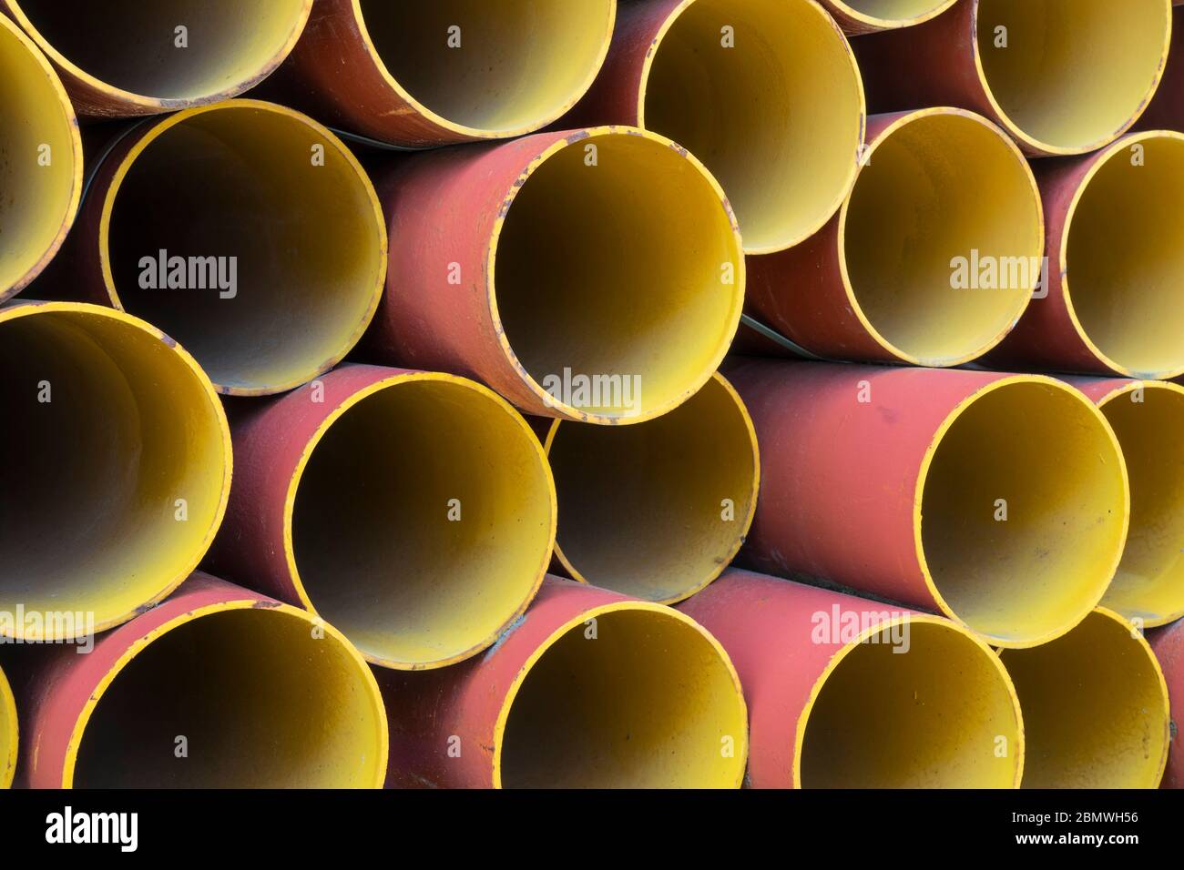 Stack of pipes on a construction site Stock Photo - Alamy