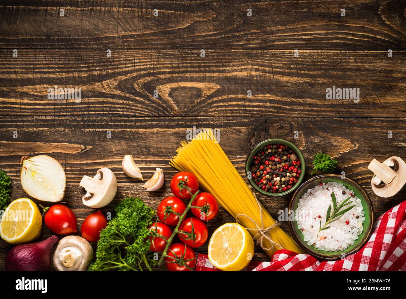 Food cooking background on wooden kitchen table Stock Photo - Alamy