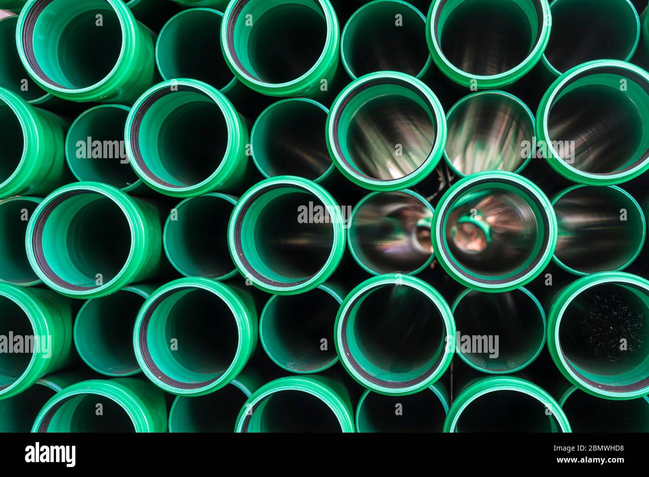 Stack of pipes on a construction site Stock Photo - Alamy