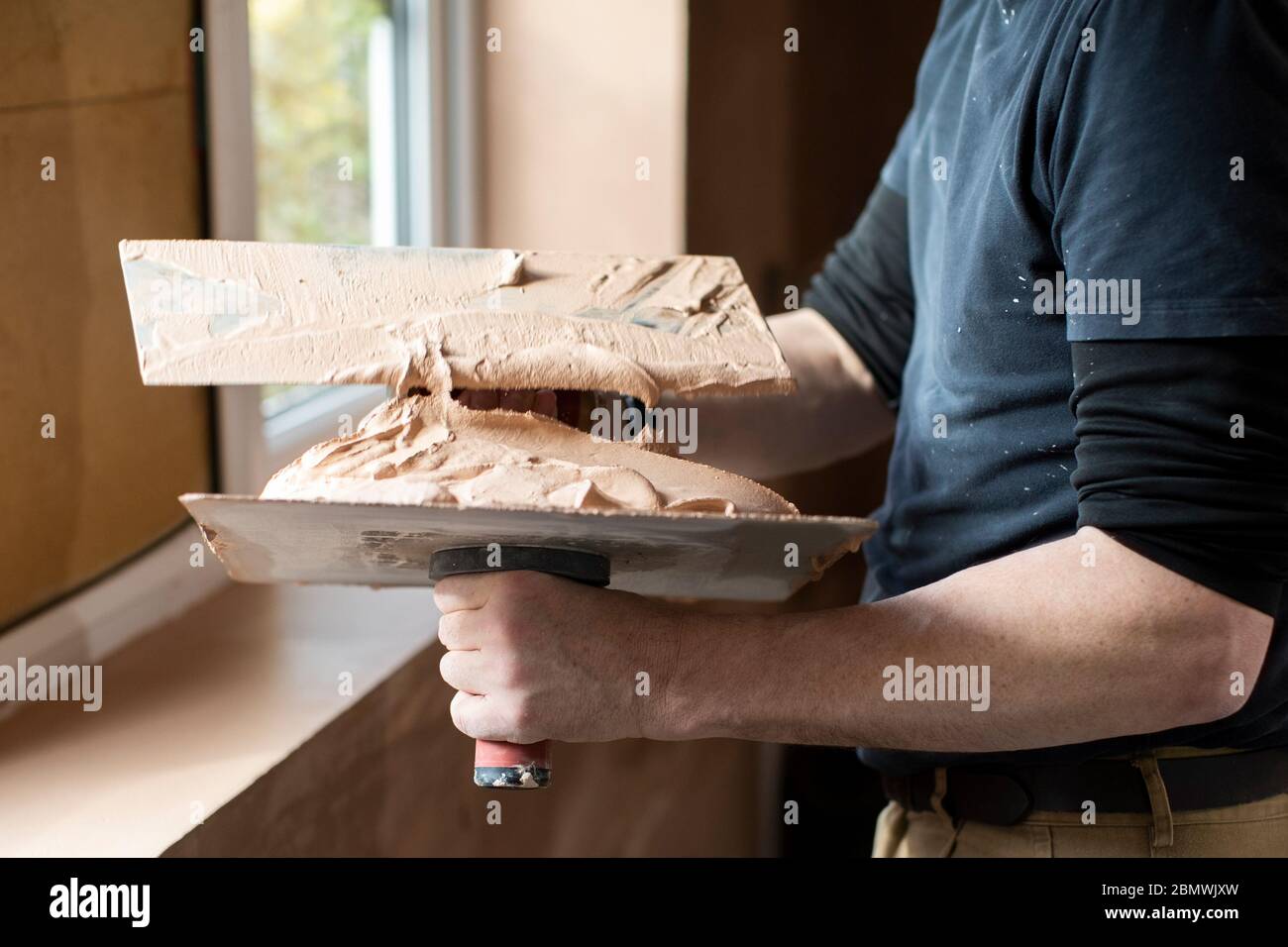 Man plasterer hi-res stock photography and images - Alamy