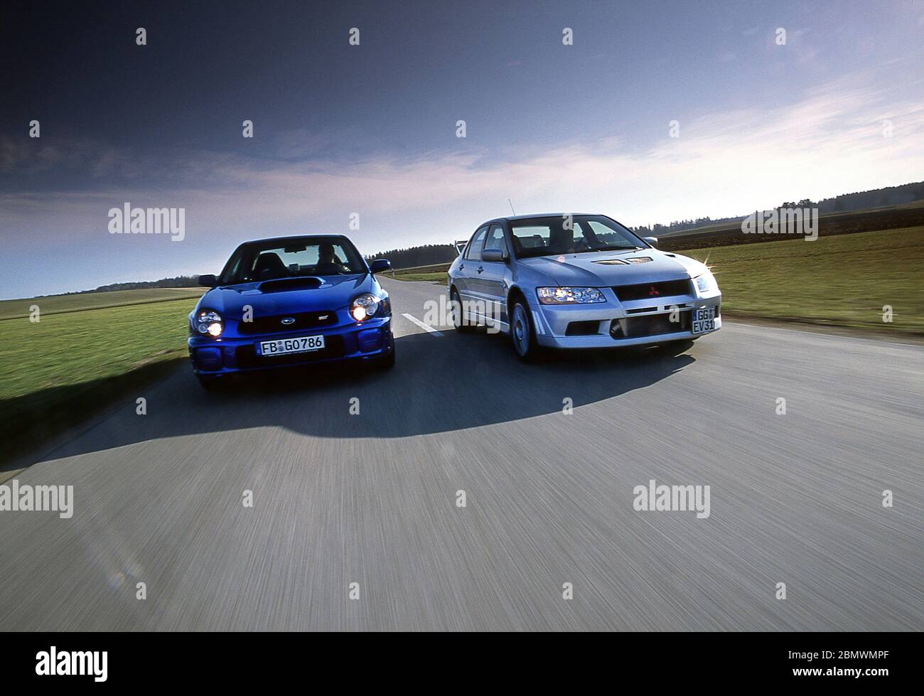 2002 Mitubishi EVO VII (Silver) and Subaru Impretza WRX STi (Blue Stock ...
