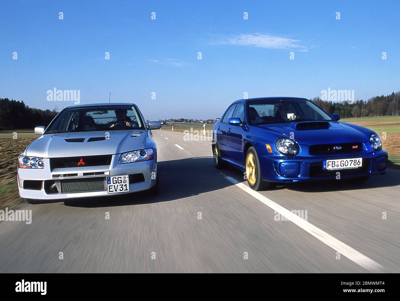 2002 Mitubishi EVO VII (Silver) and Subaru Impretza WRX STi (Blue Stock ...